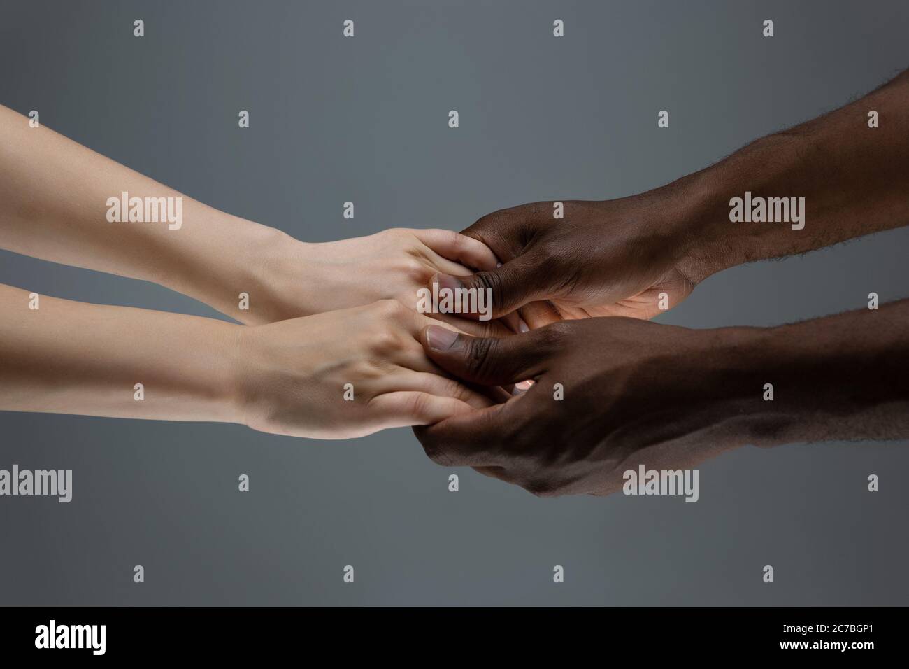 Supporting hands. Racial tolerance. Respect social unity. African and ...