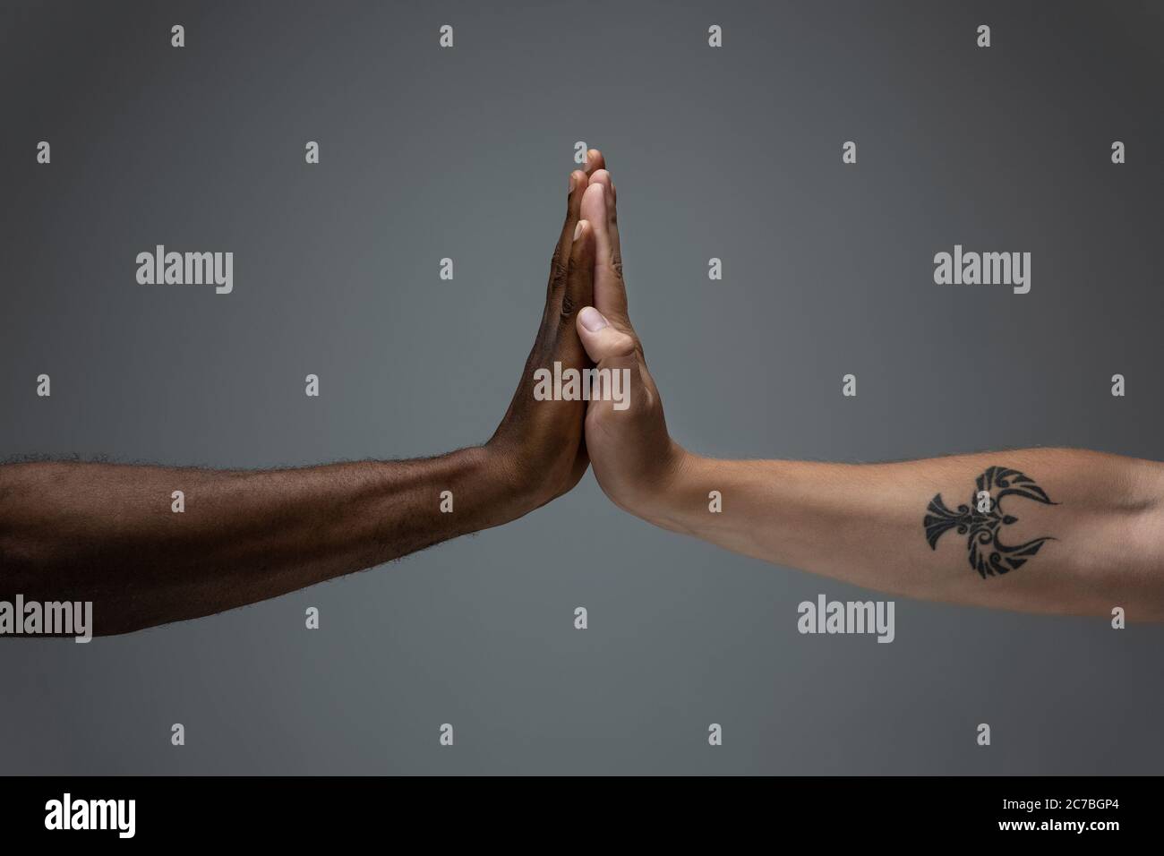 Greeting clapping. Racial tolerance. Respect social unity. African and ...