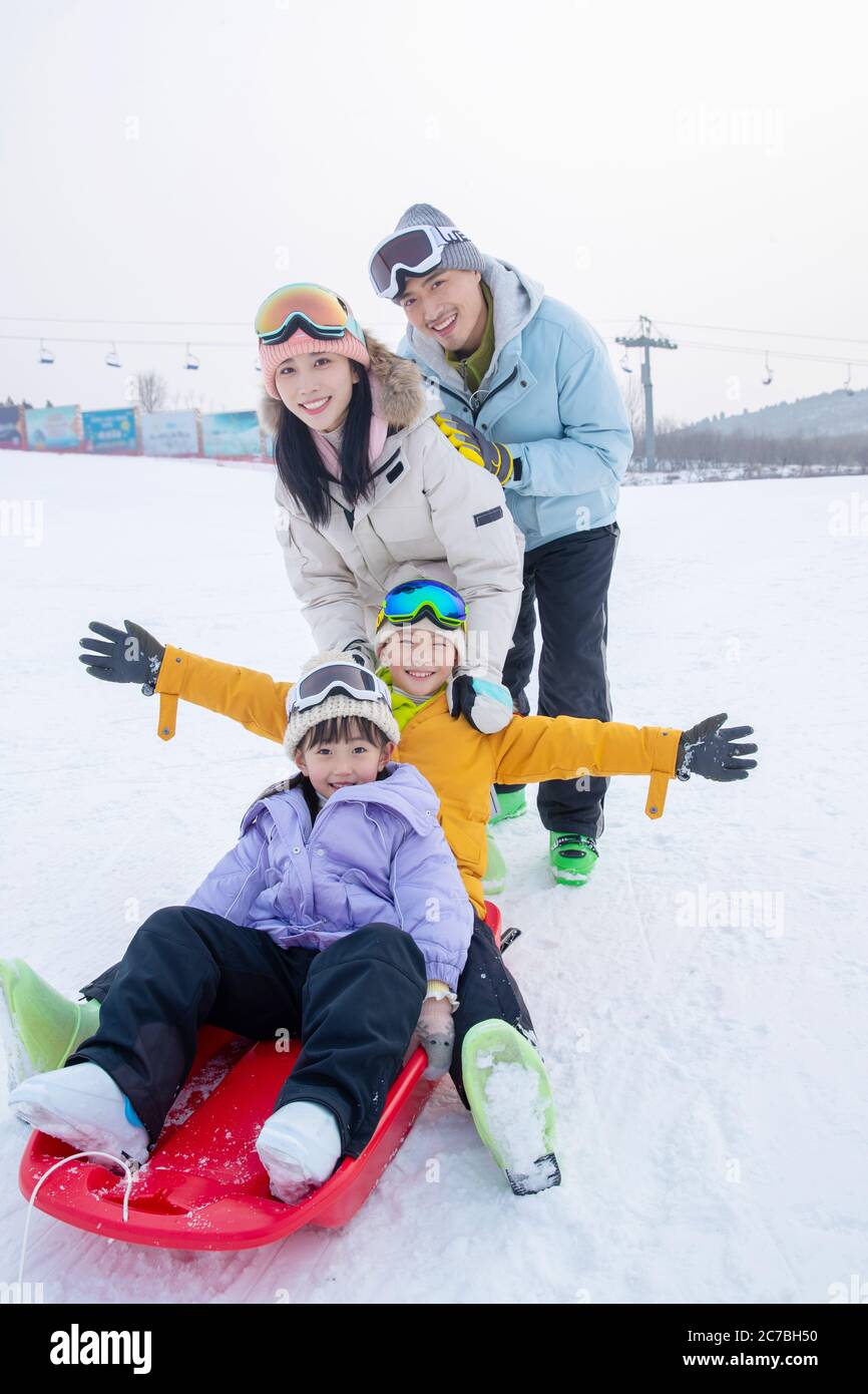 Parents pushing their children hi-res stock photography and images - Alamy