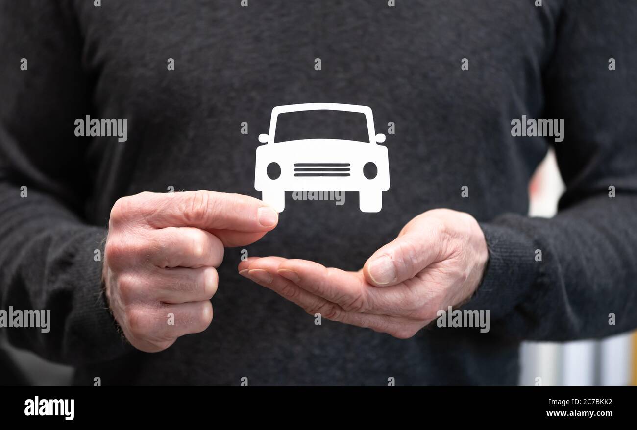 Man holding a paper car; Concept of car insurance Stock Photo - Alamy