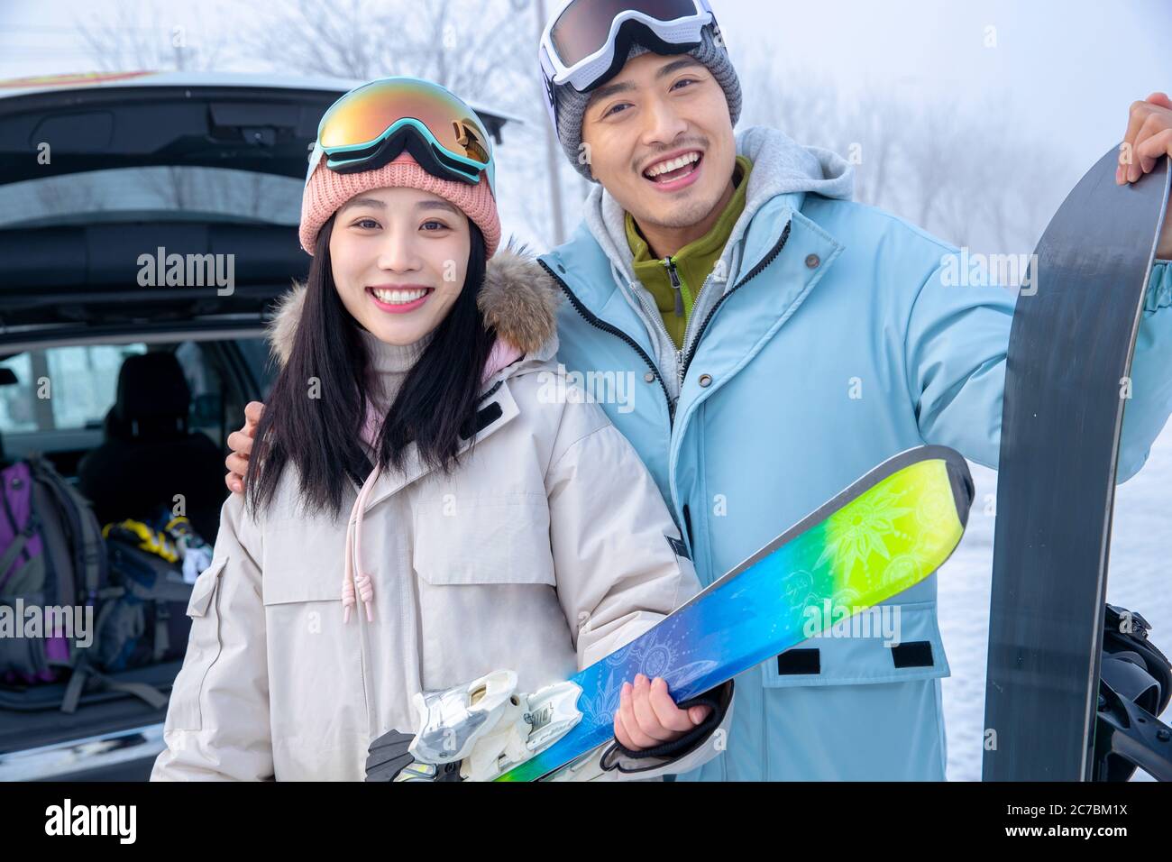 Holding skis together hi-res stock photography and images - Alamy