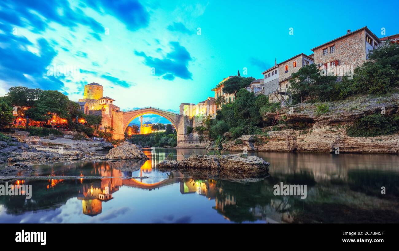 Majestic evening view of Mostar with the Mostar Bridge, houses and ...