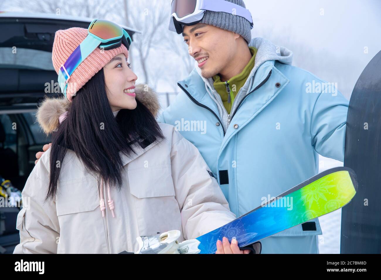 Holding skis together hi-res stock photography and images - Alamy