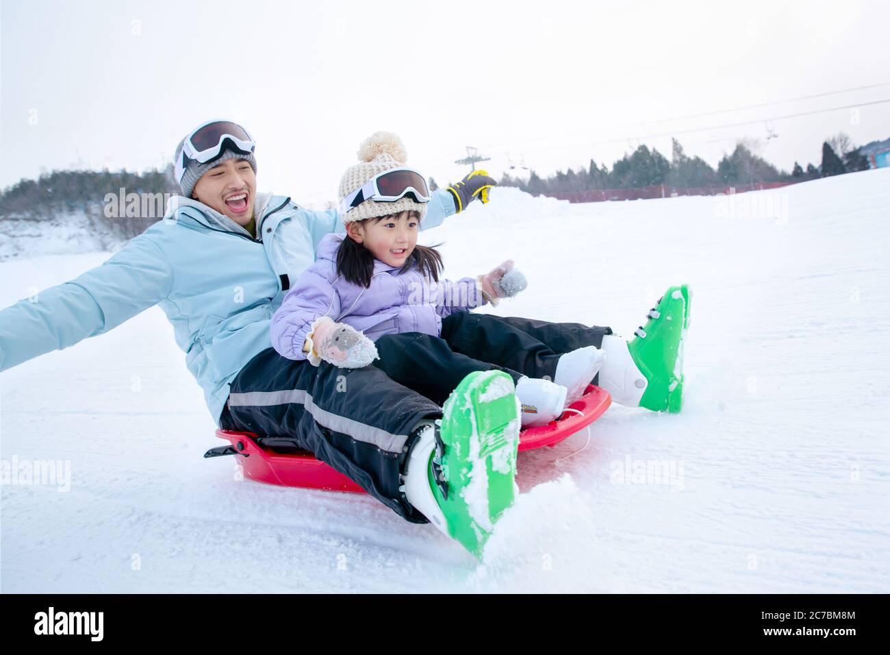 Ski happy father sits snow snowboarding Stock Photo - Alamy