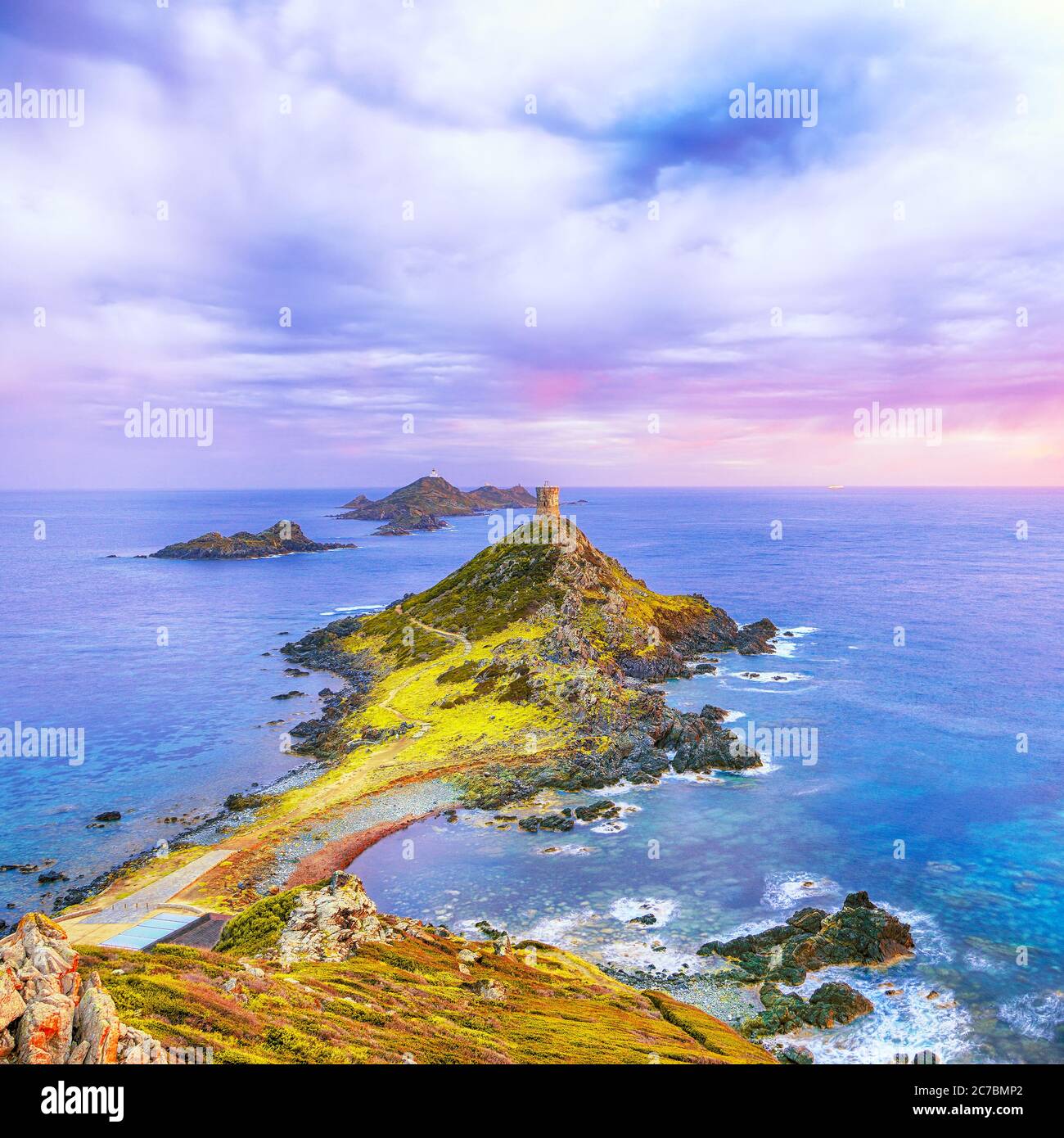 Sunset over popular tourist destination Torra di a Parata with Genoese ...
