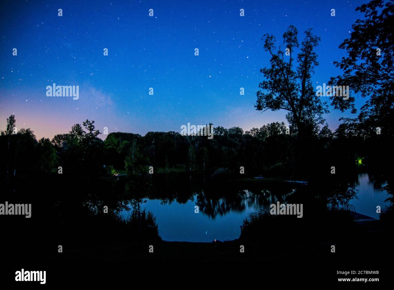 Starry sky over lake hi-res stock photography and images - Alamy