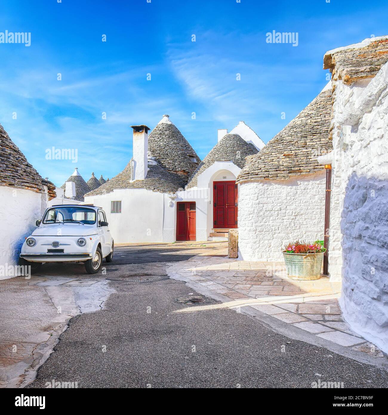 Trulli of Alberobello typical houses street view. Town of Alberobello ...
