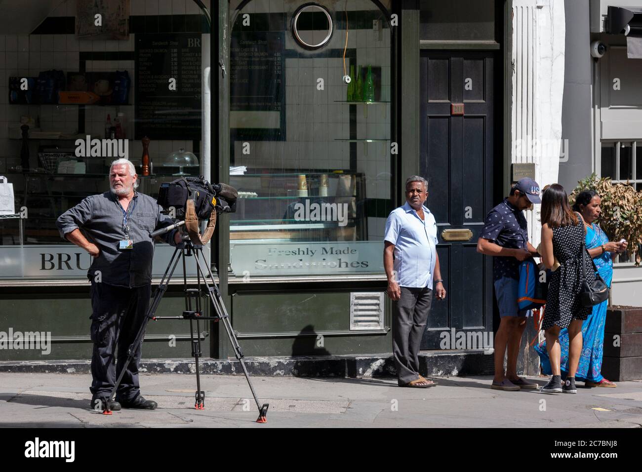 Cameraman high hi-res stock photography and images - Alamy