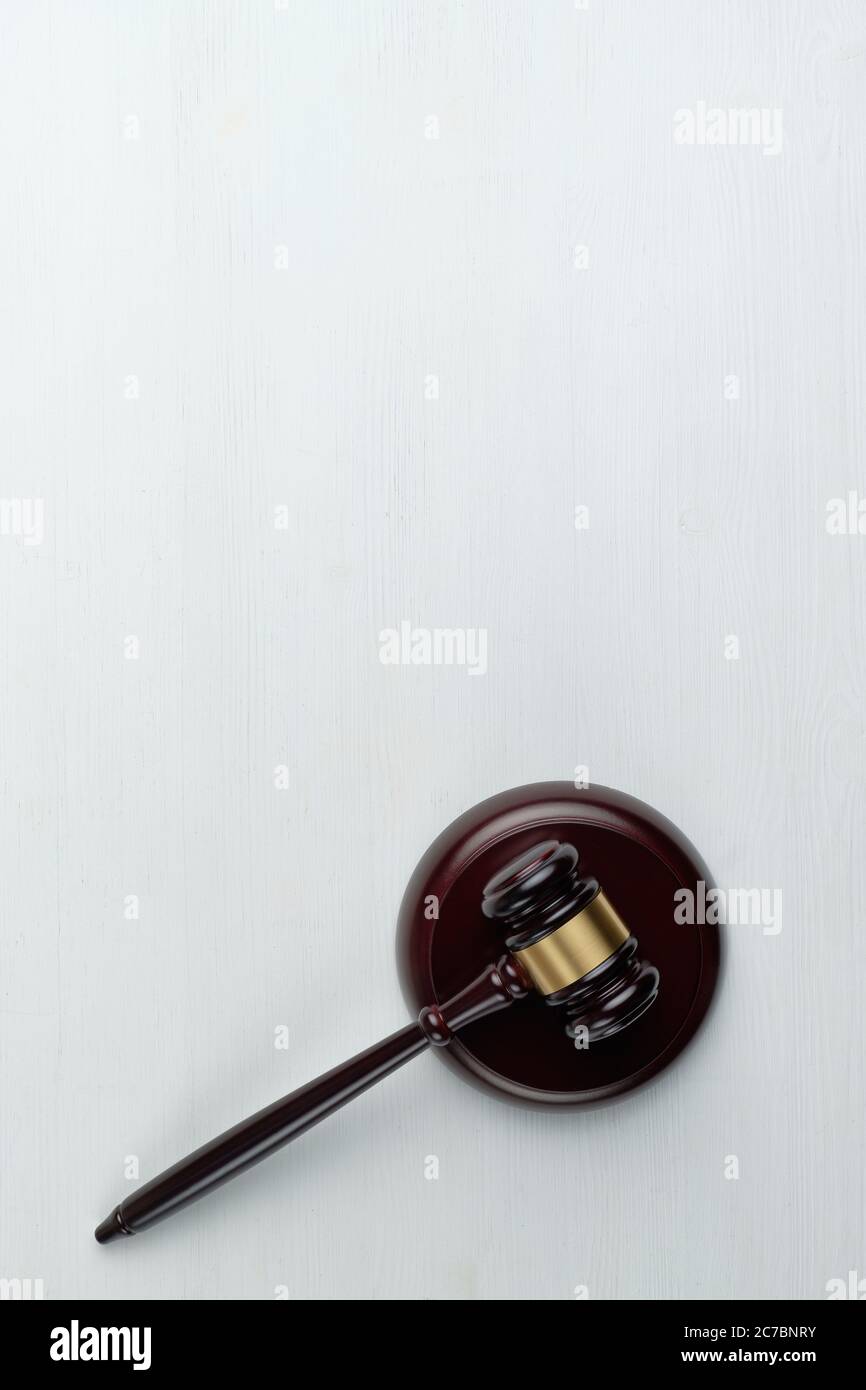 Hammer judges on a white wooden background with a copy of space and top ...