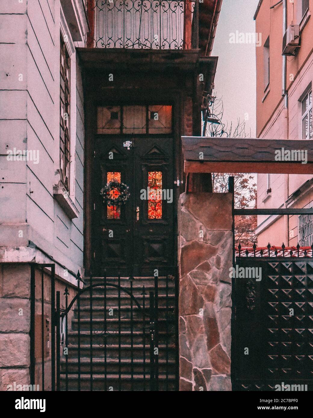 Entrance through the gate Stock Photo - Alamy