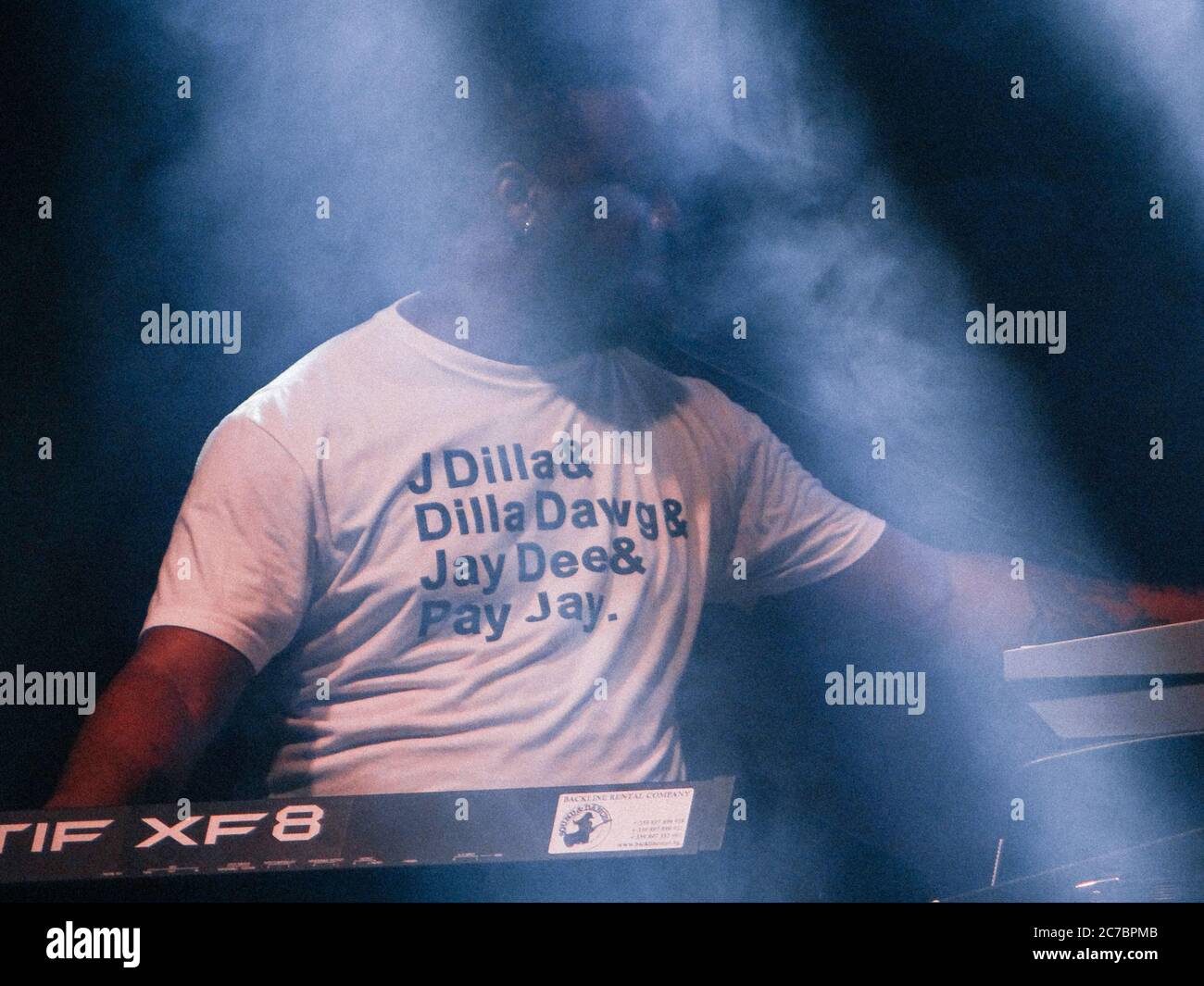 Musician plays a synthesizer Stock Photo - Alamy