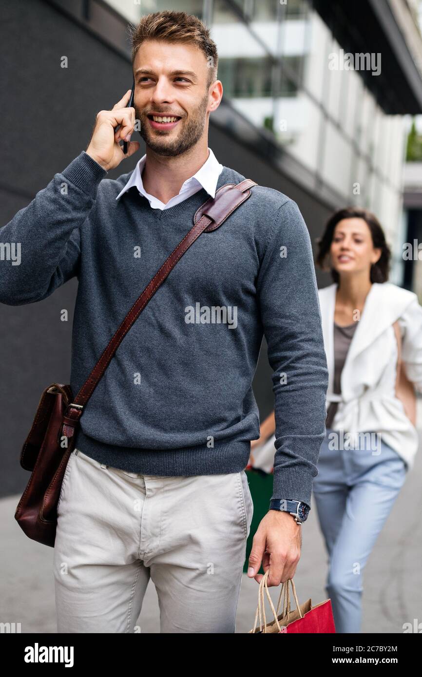 Man shopping bags hi-res stock photography and images - Alamy