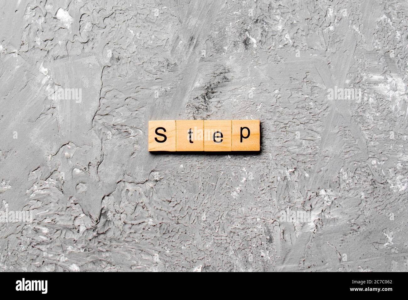 step word written on wood block. step text on table, concept Stock ...
