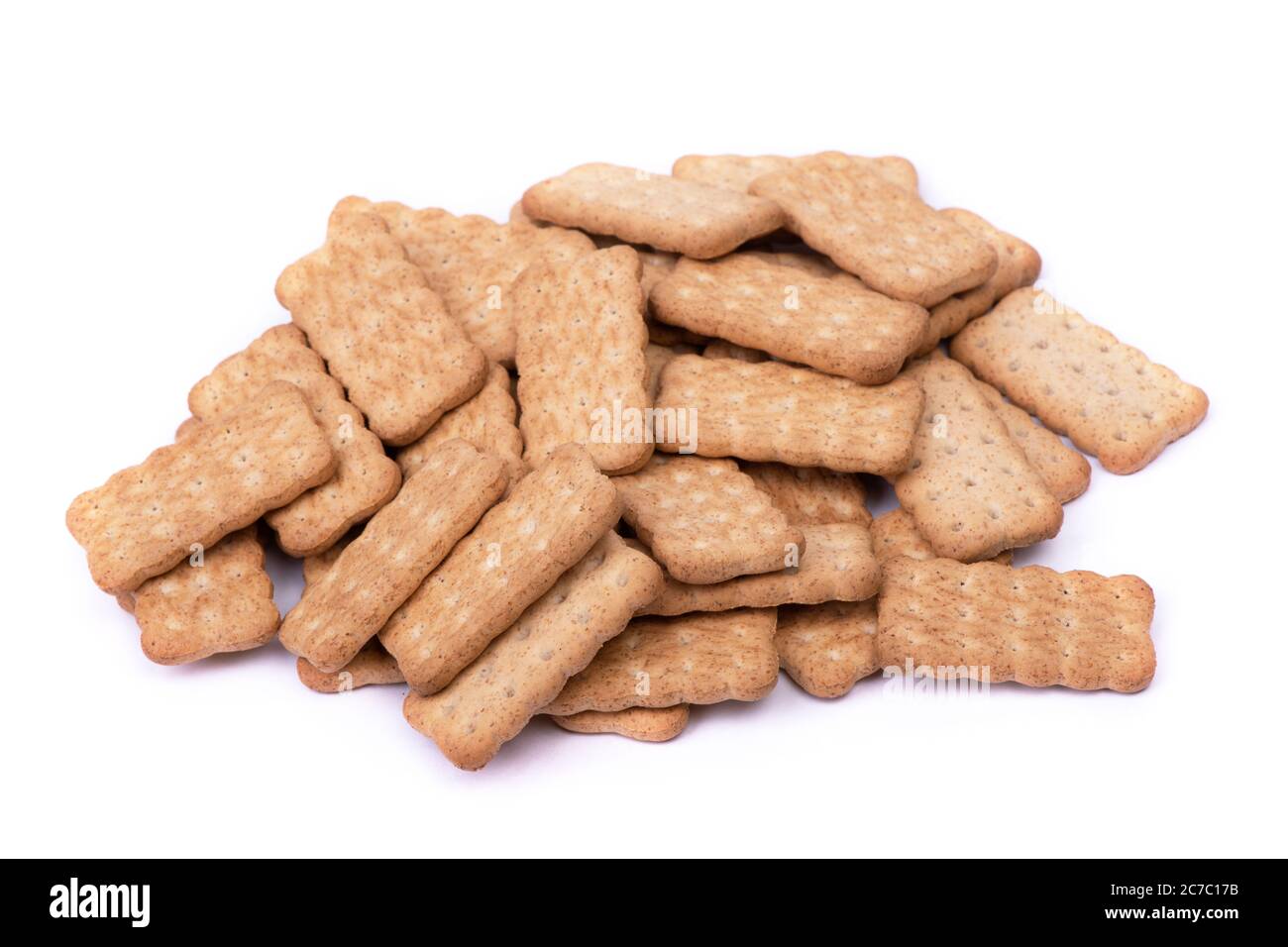 Heap of simple small cookies isolated over white background Stock Photo ...
