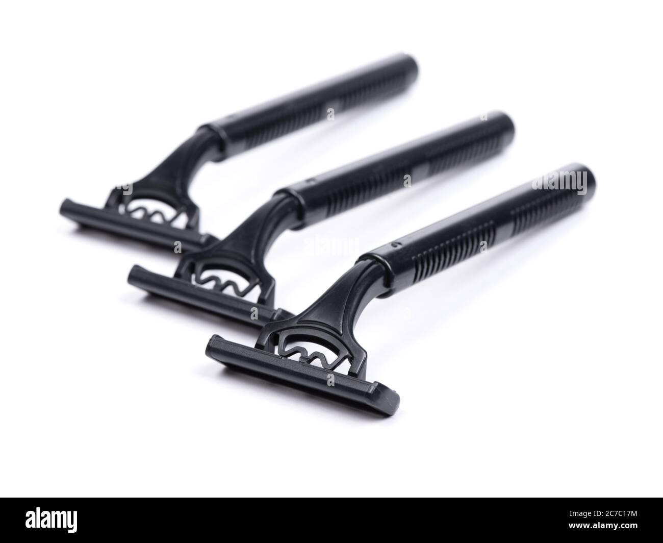 Group of new black plastic disposable shavers isolated on white ...