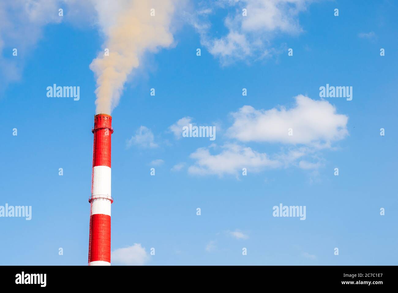 Industrial chimneys smoke smog on blue sky. Air pollution disaster ...