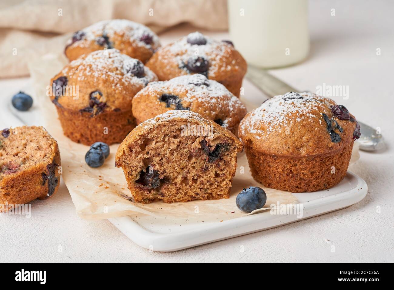 Blueberry muffin, side view, close up. Cupcakes section with berries on ...