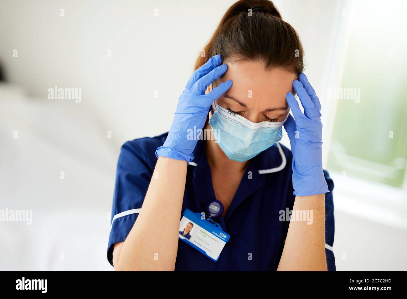 Attractive female nurse stress hi-res stock photography and images - Alamy