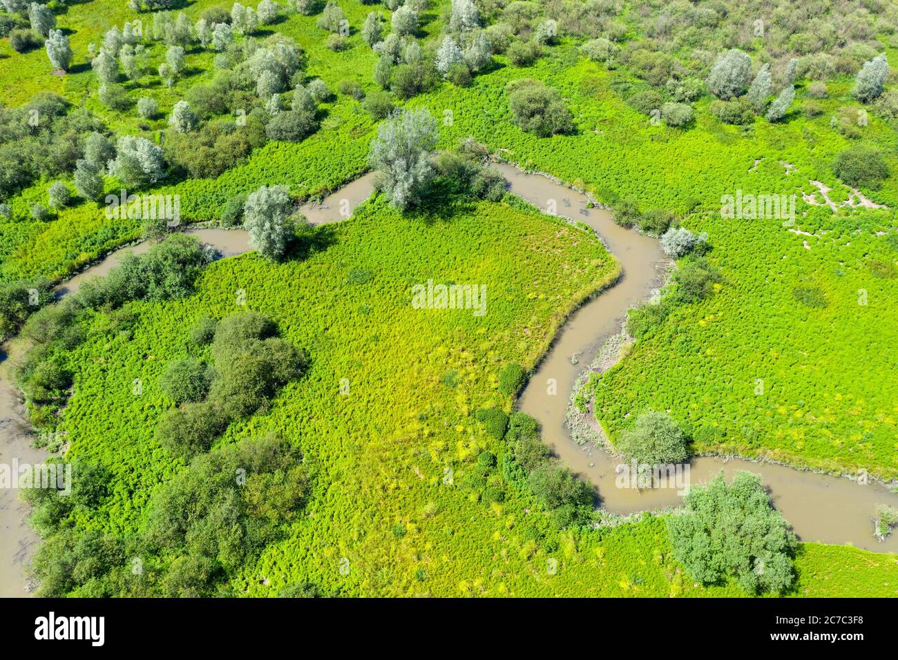 Aerial view of the Sutla (Sotla) River, a border of Croatia and ...
