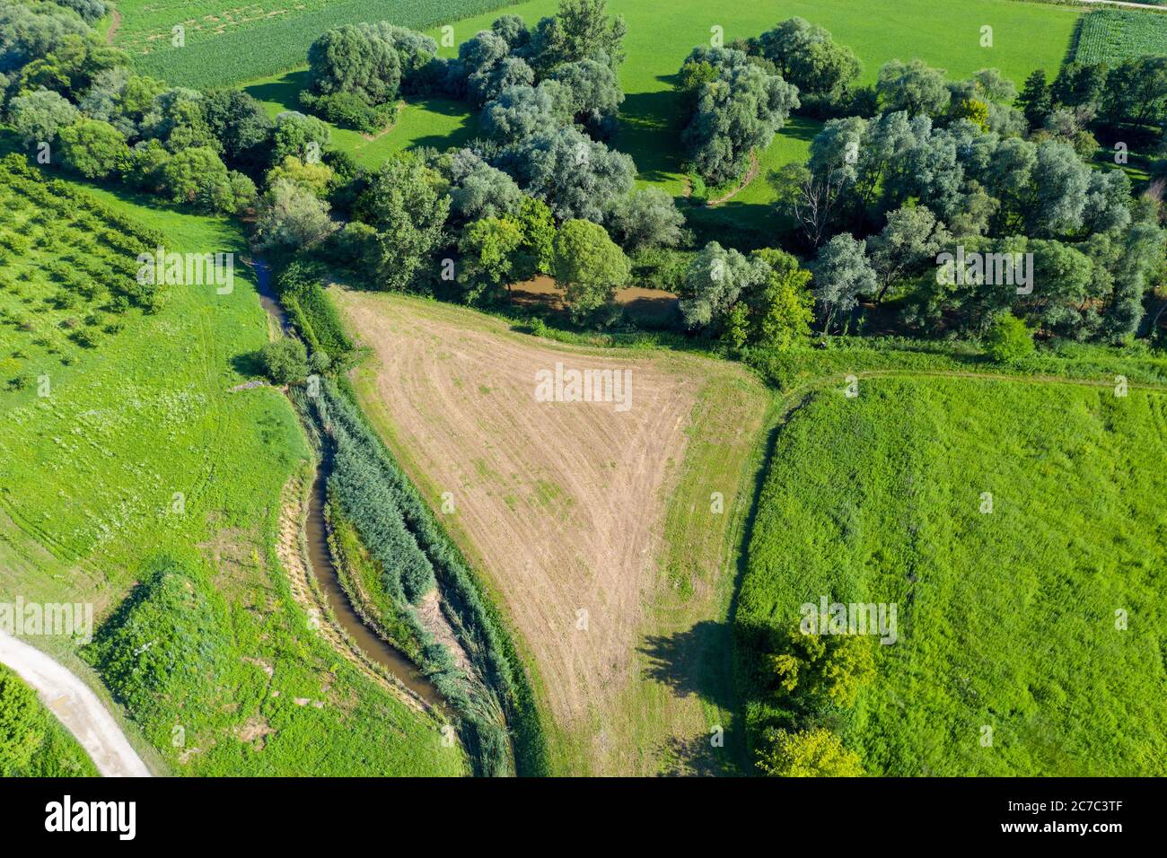 Aerial view of the Sutla (Sotla) River, a border of Croatia and ...