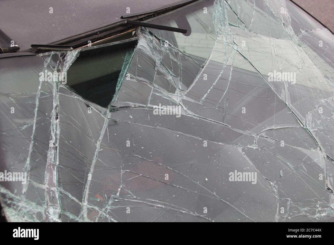 Car windscreen broken after crash Stock Photo - Alamy