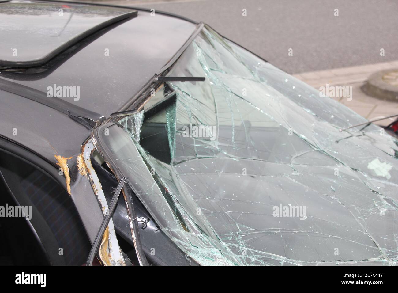 Car windscreen broken after accident Stock Photo - Alamy