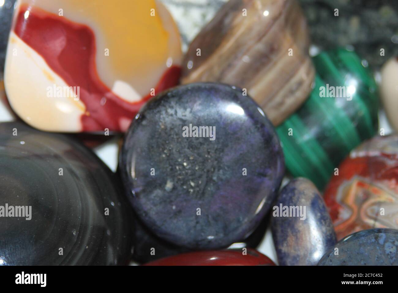Variety of semi-precious stone healing stones different colors Stock ...