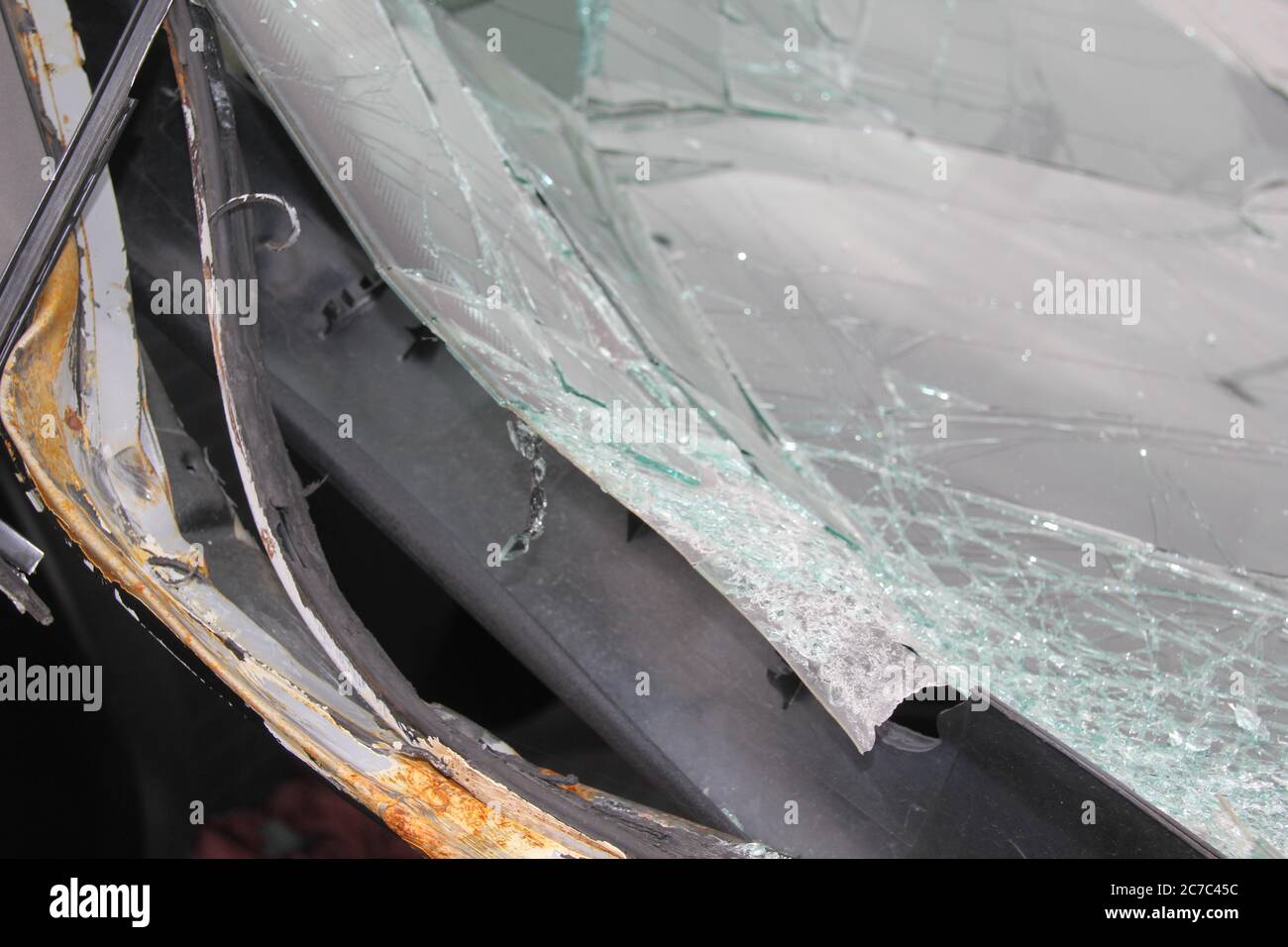 Car windscreen broken after crash Stock Photo - Alamy