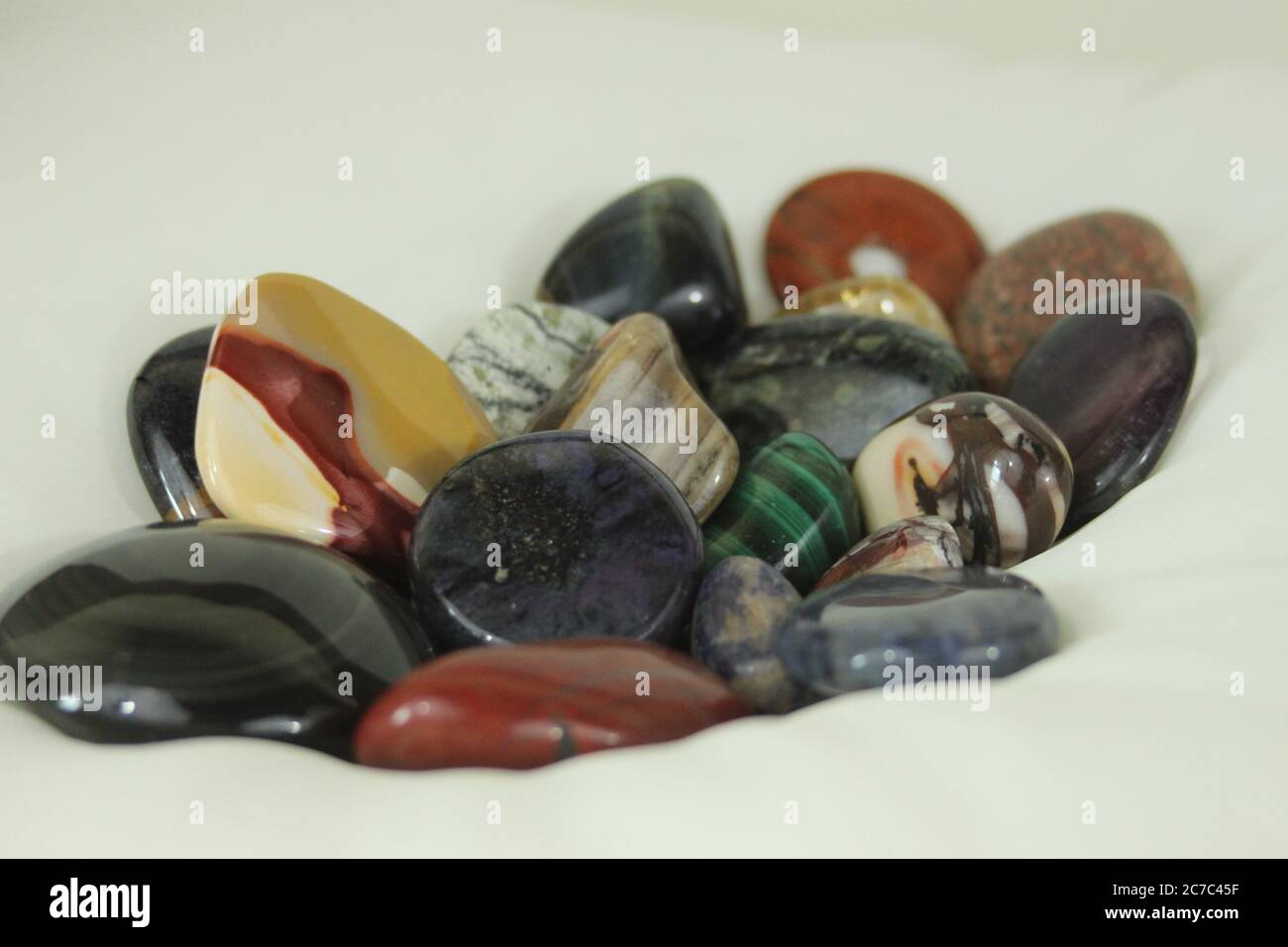 Variety of semi-precious stone healing stones different colors Stock ...