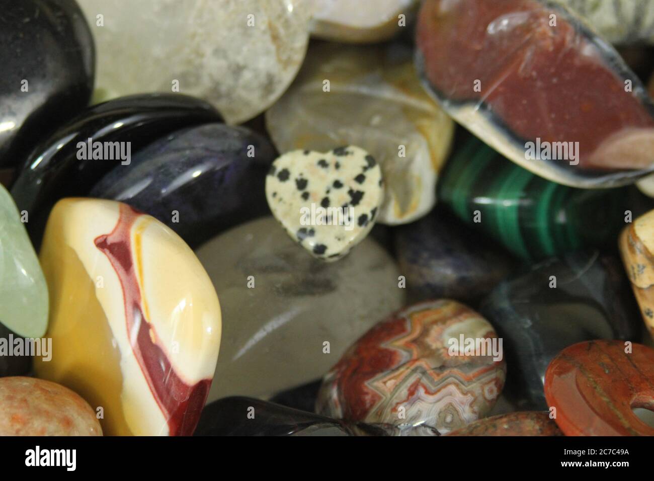 Variety of semi-precious stone healing stones different colors Stock ...