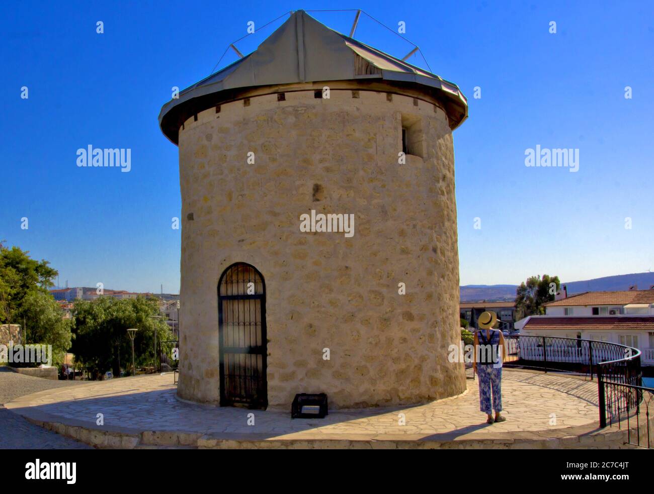 Woman front windmill hi-res stock photography and images - Alamy