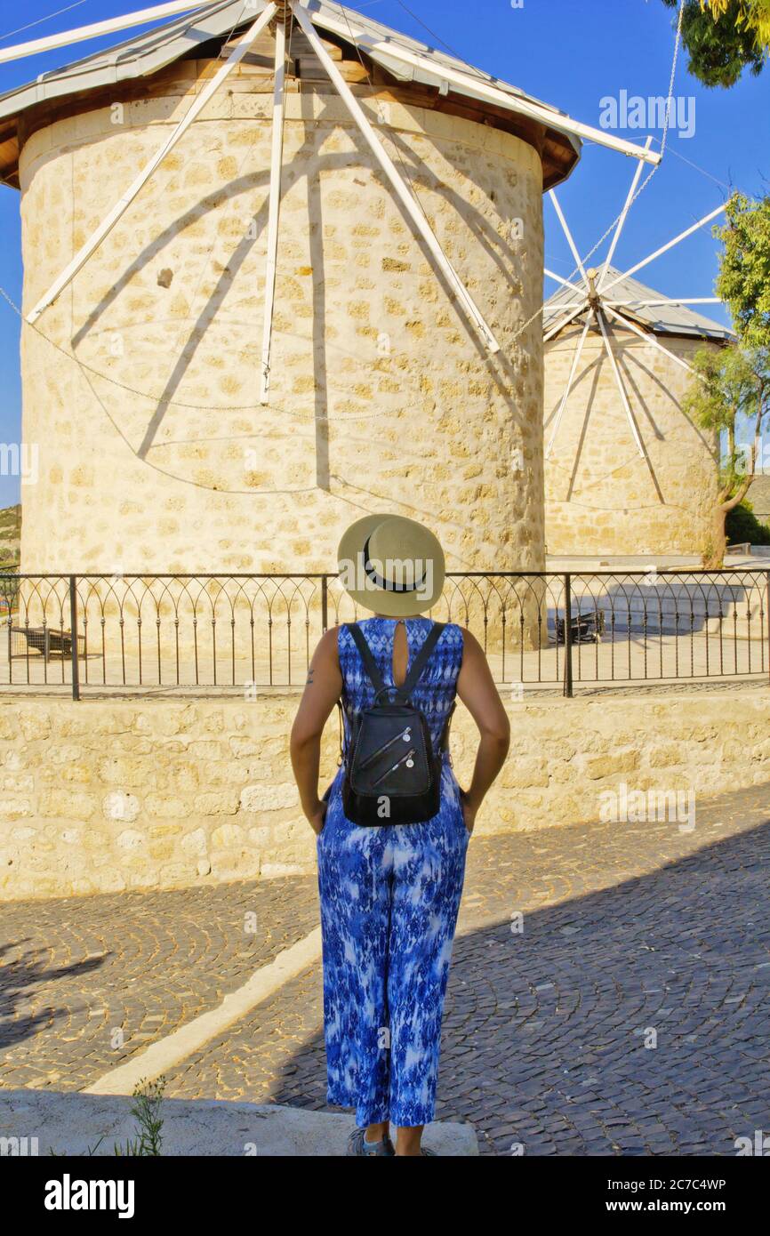 Woman front windmill hi-res stock photography and images - Alamy