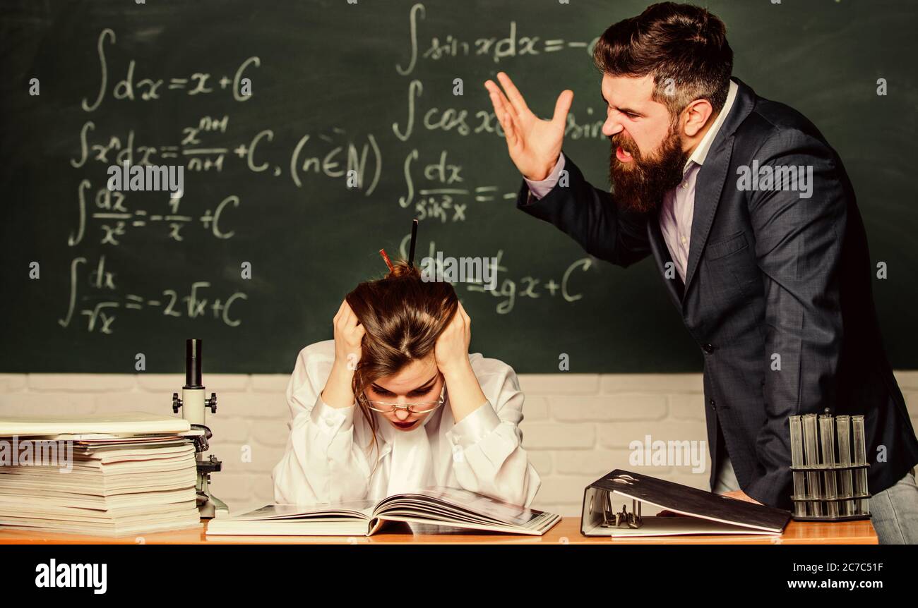 Teacher strict serious bearded man having conflict with student girl ...