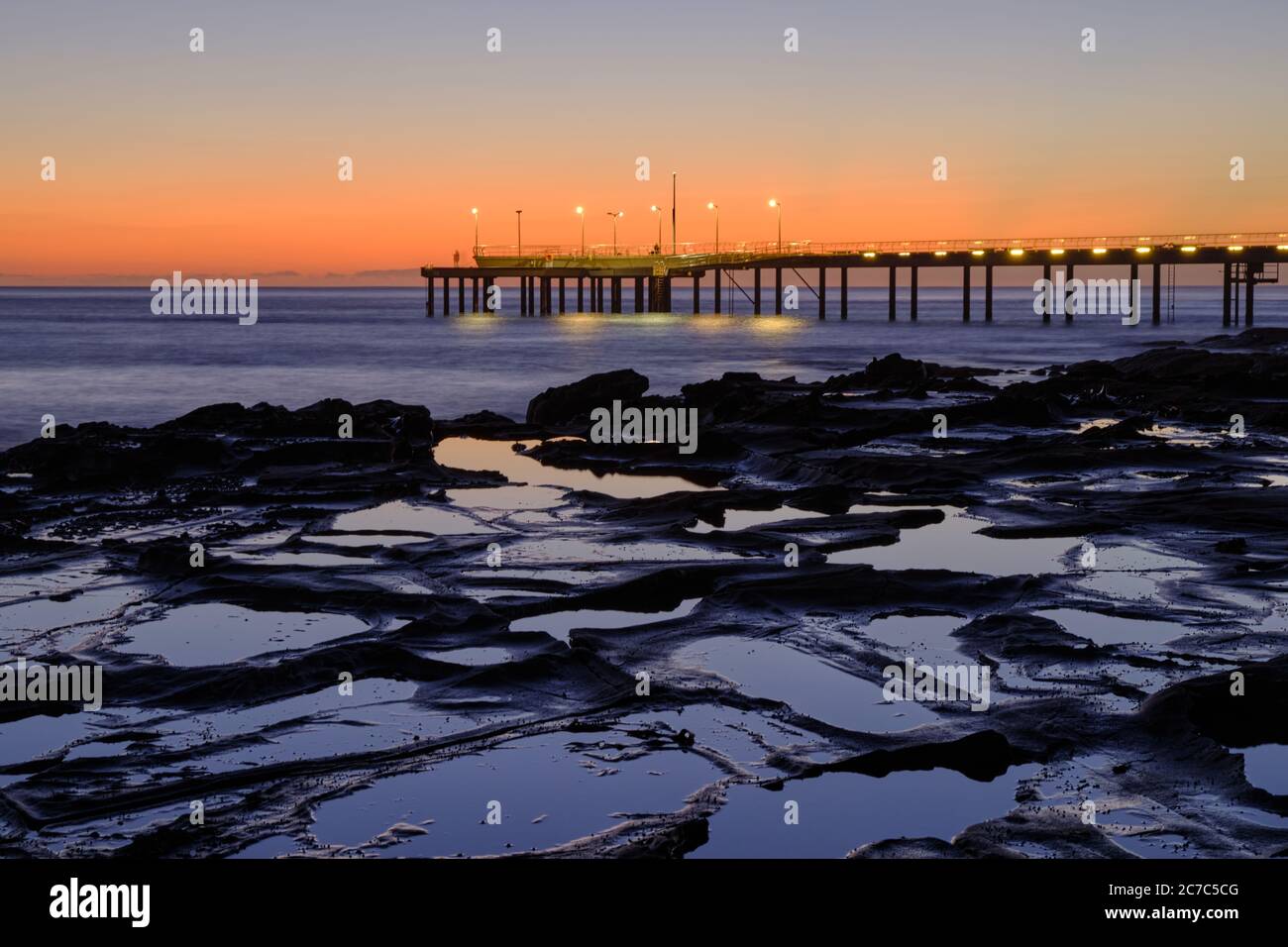 Pier over rocks hi-res stock photography and images - Alamy