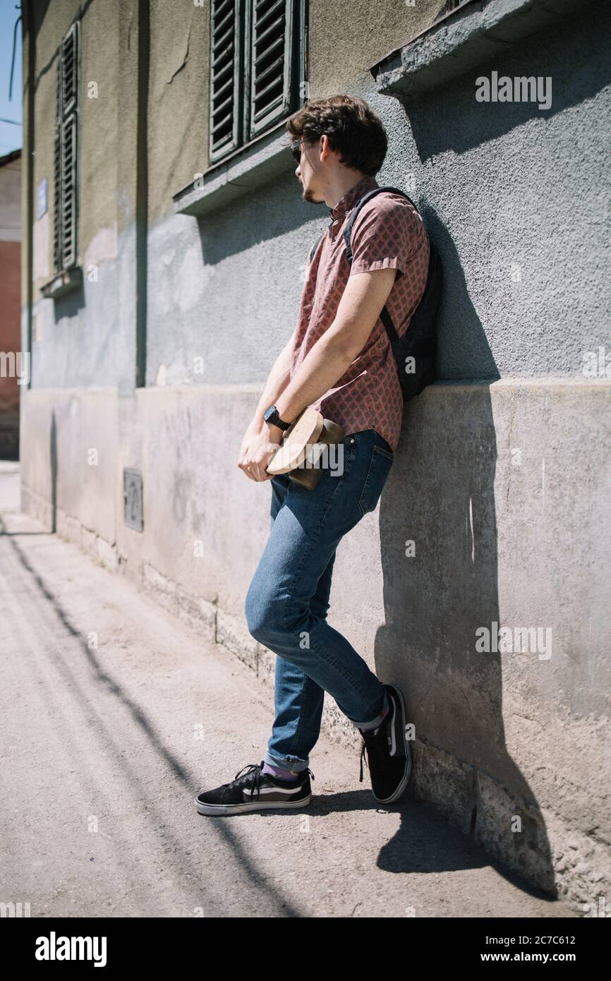 Man Leaning Against Wall High Resolution Stock Photography and Images ...