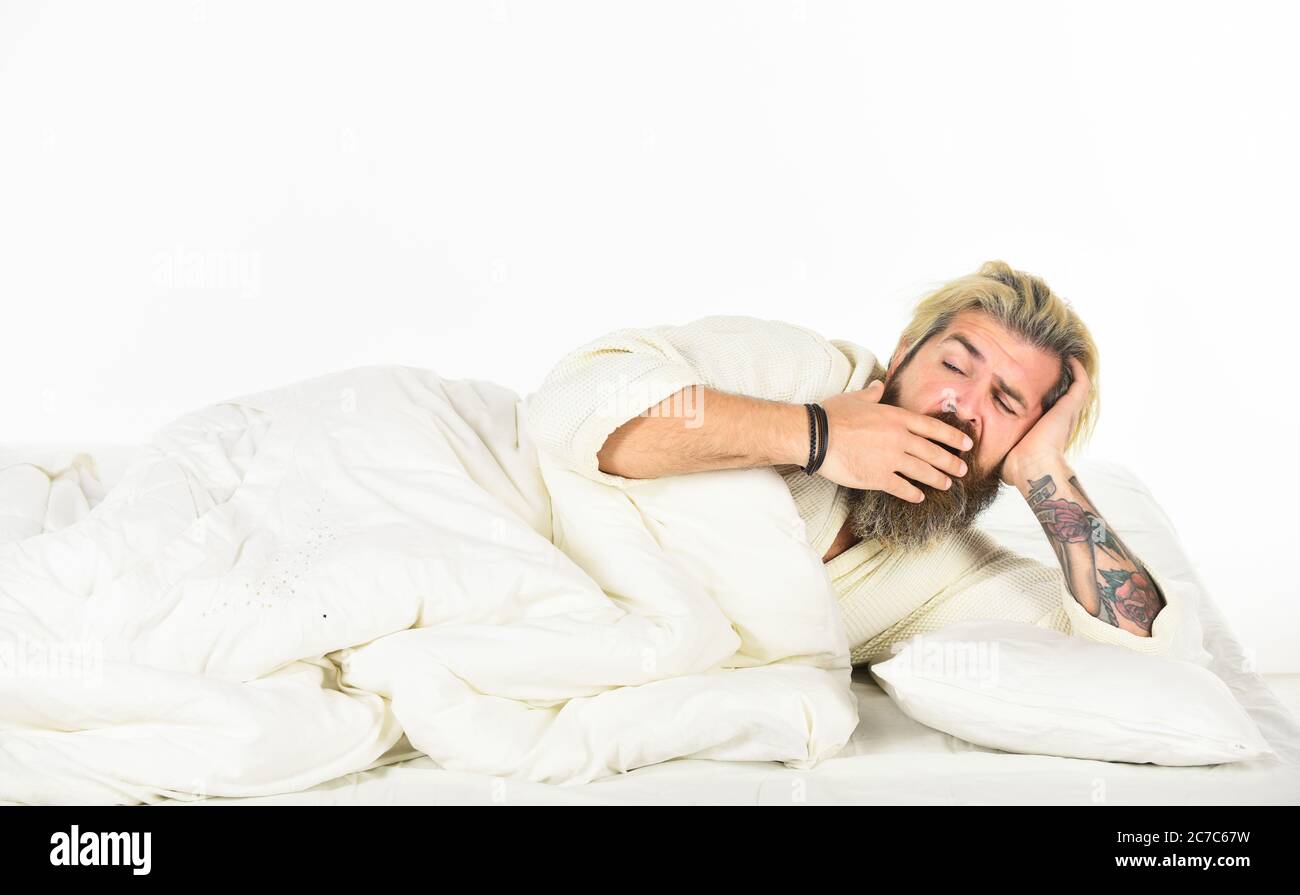 Nap and sleep. Man sleepy face lies on pillow. Interrupted sleep. Sleep ... Nap and sleep. Man sleepy face lies on pillow. Interrupted sleep. Sleep ...