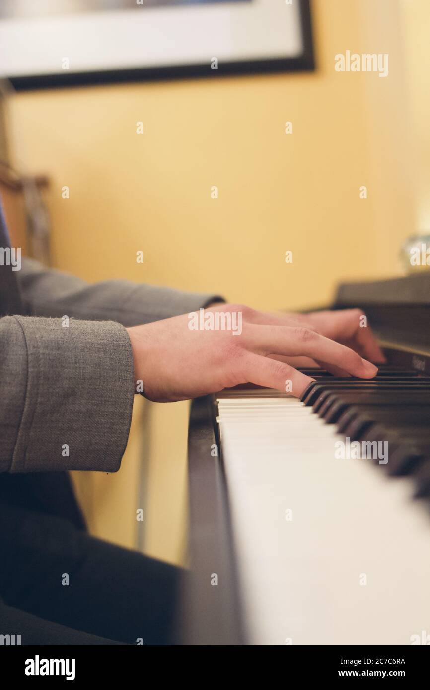 Human hand playing electric piano hi-res stock photography and images ...