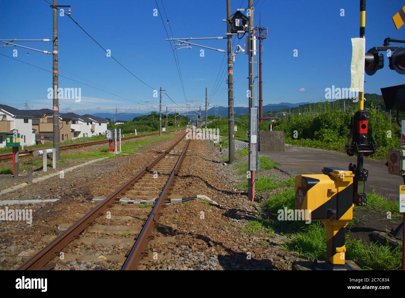 Horizontal shot of a rural Japanese railroad during daytime Stock Photo ...