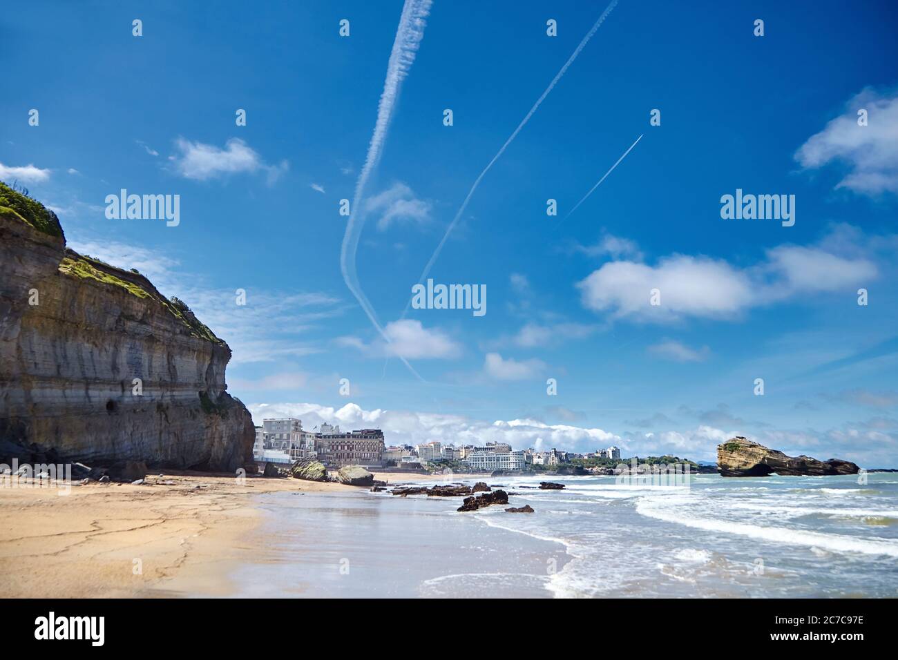 Biarritz city and its famous sand beaches. Stones, ocean waves ...