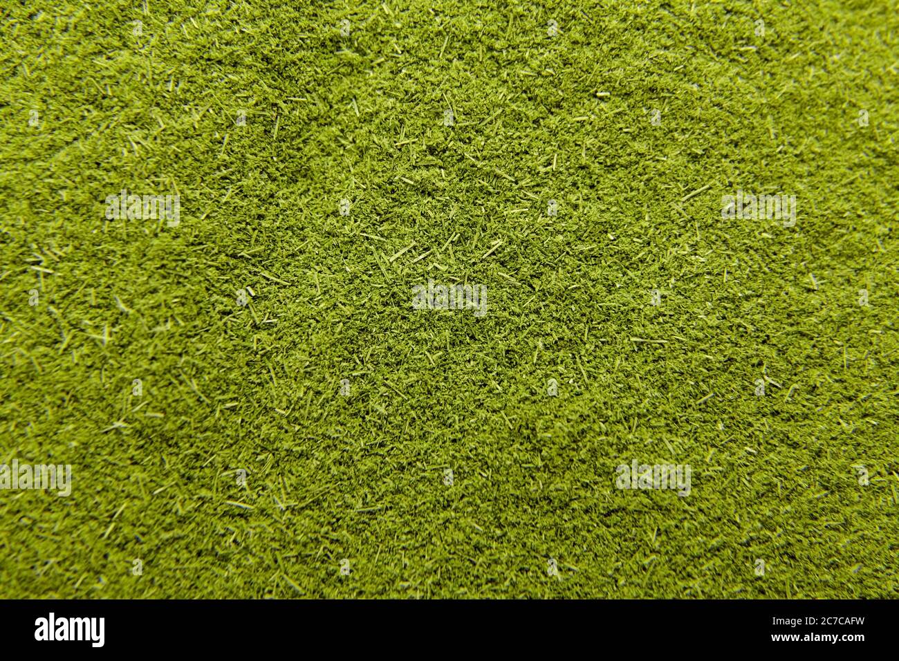 Green young wheatgrass powder texture. Food background Stock Photo - Alamy