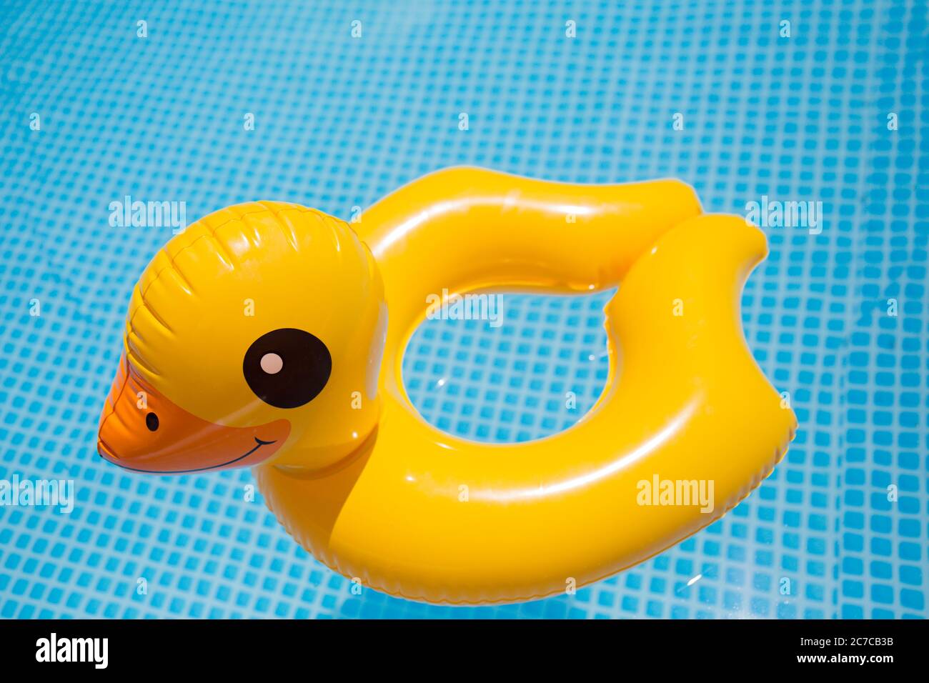 yellow rubber duck floating in pool for baby to play on carefree ...