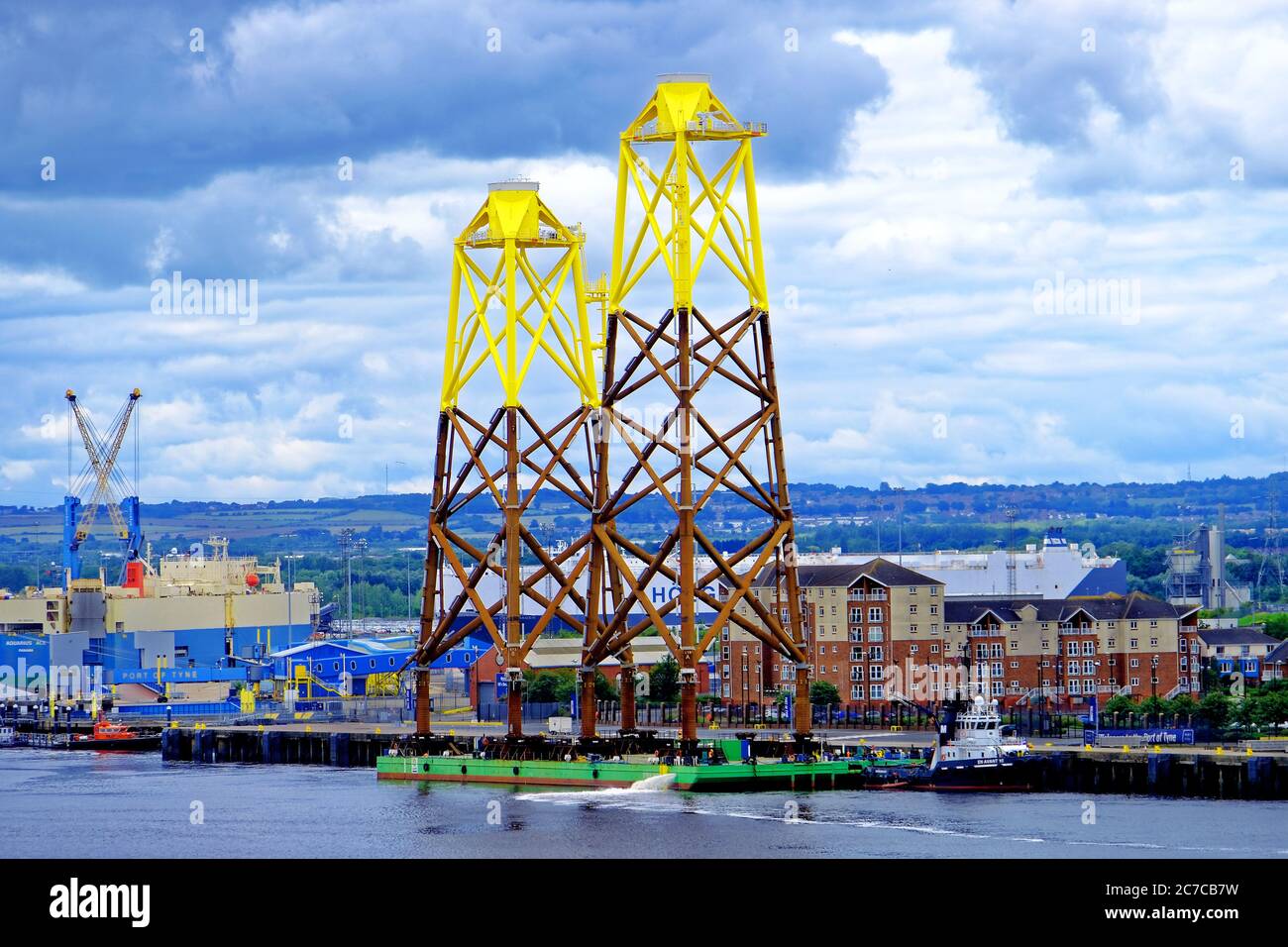 Barge discharging water to equalise balance in the Tyne whilst ...