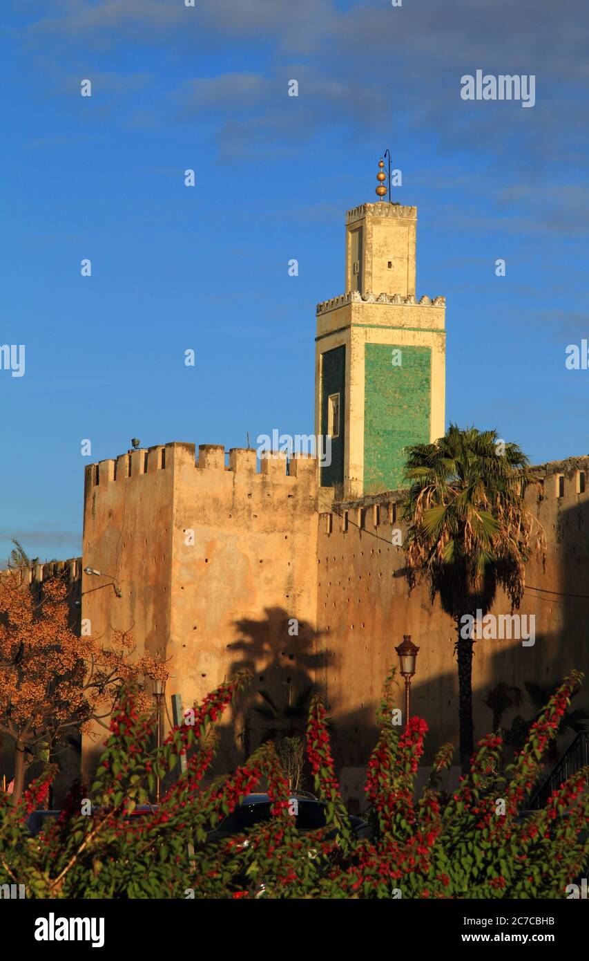 Morocco, Meknes, Historical city wall and mosque minaret in Arabesque ...