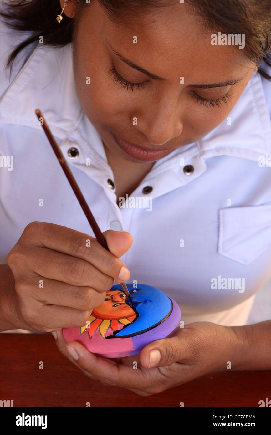 Akumal, Quintana Roo, Mexico - November 26, 2006: Young Mayan artist ...
