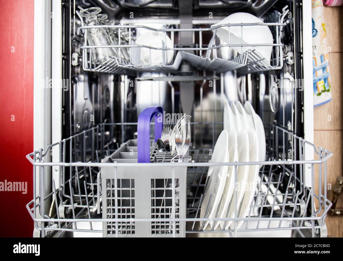 using dishwasher to save time in cleaning plates and glassware and ...