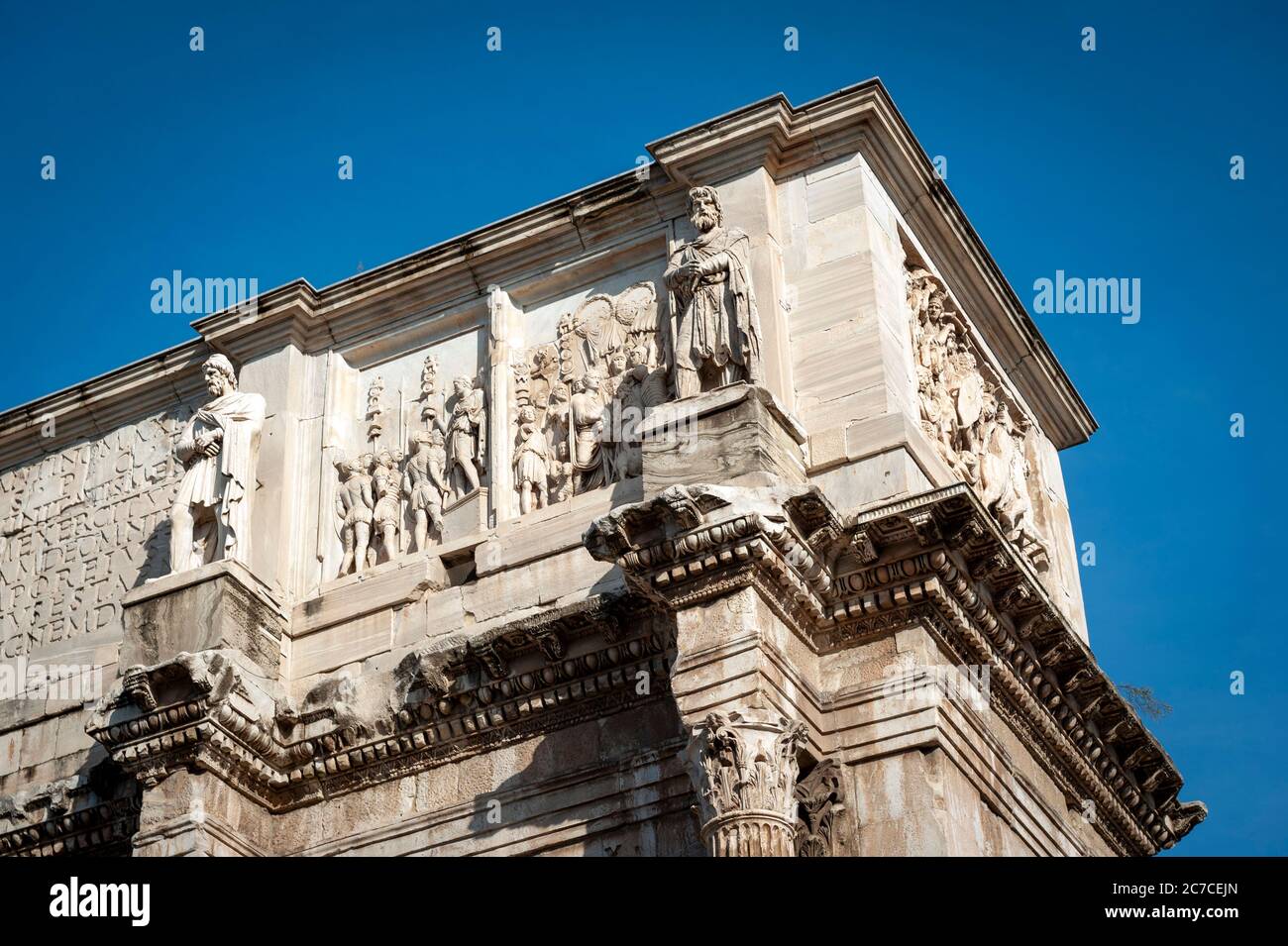 Close-up details of relief panels, round reliefs, and frieze on the ...