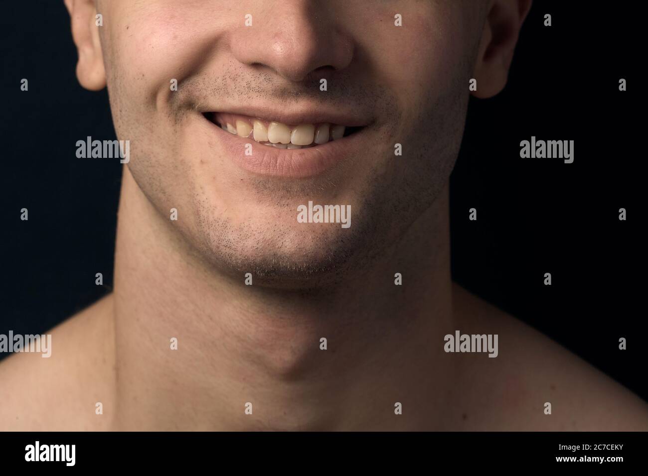 Shaved male chin close-up. With smile Stock Photo - Alamy