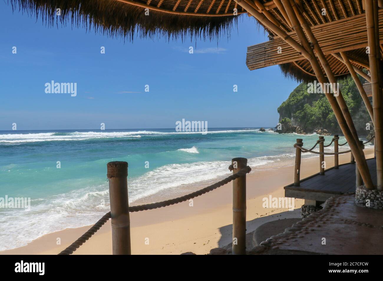 Outdoor restaurant at the beach. Cafe on the beach, ocean and sky. View ...
