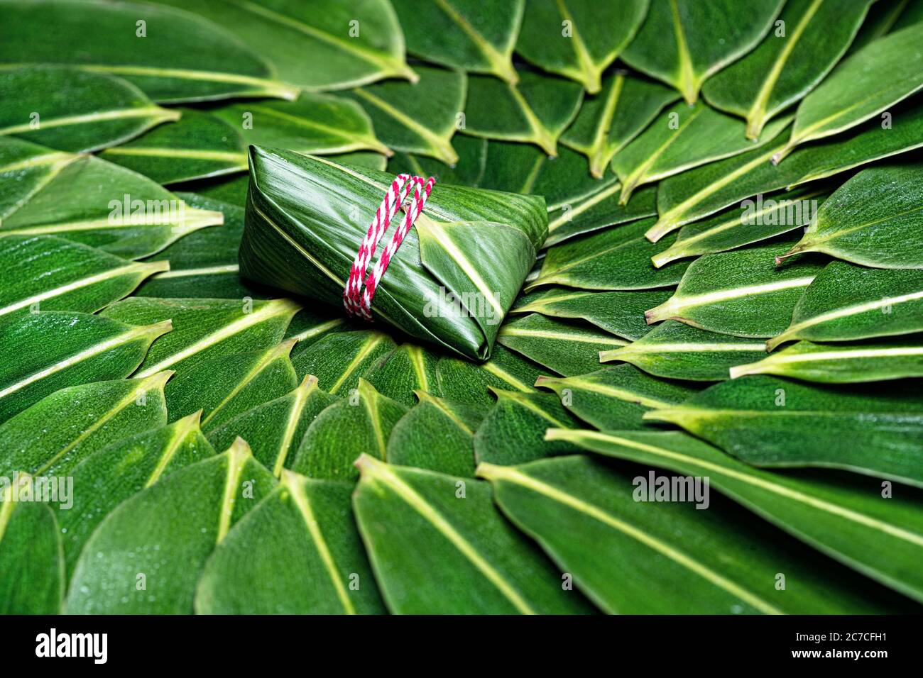 Rice dumplings and leaves Stock Photo - Alamy