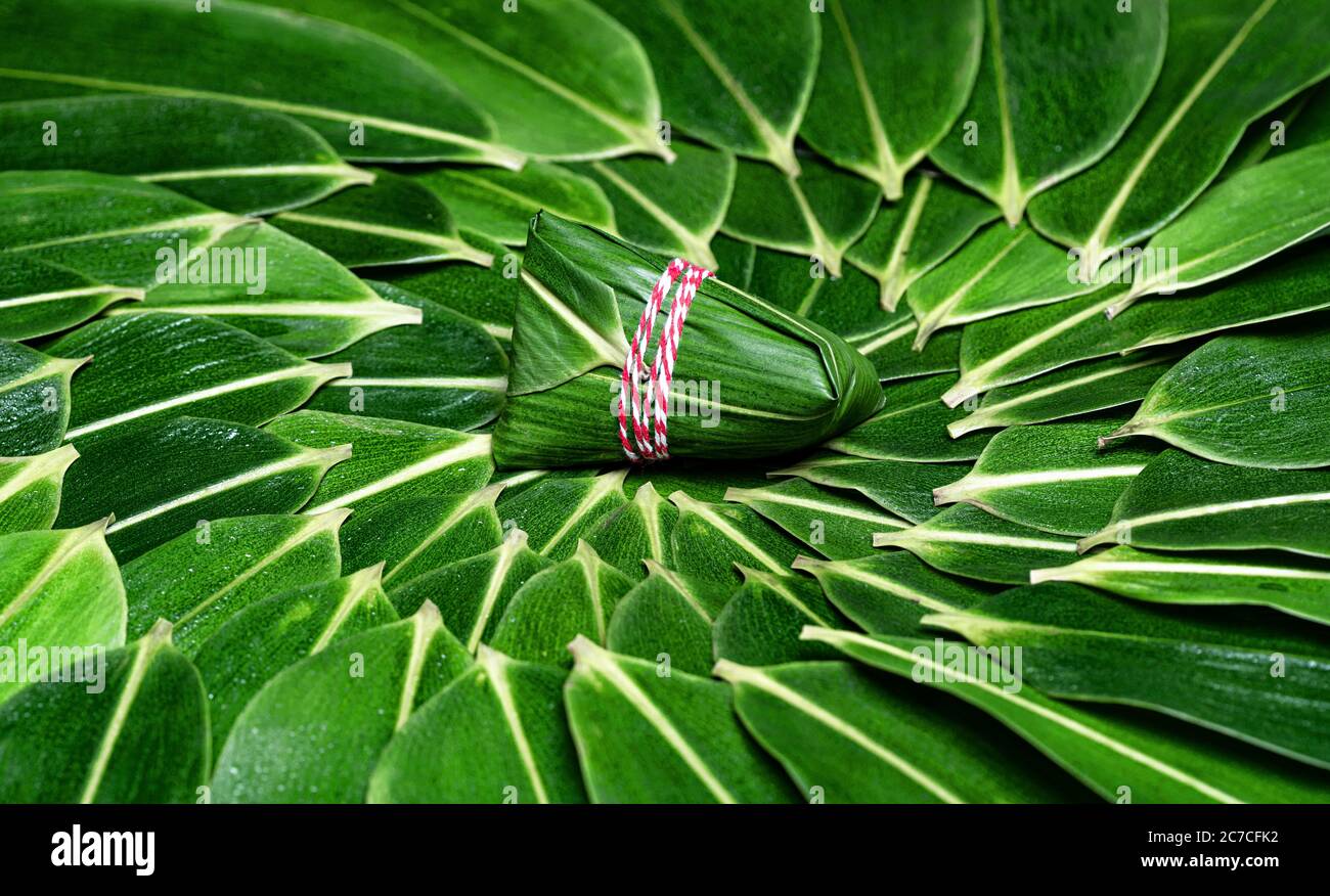 Rice dumplings and leaves Stock Photo - Alamy